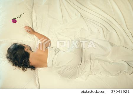 Beautiful naked female sleeping in bed 스톡사진 37045921 PIXTA