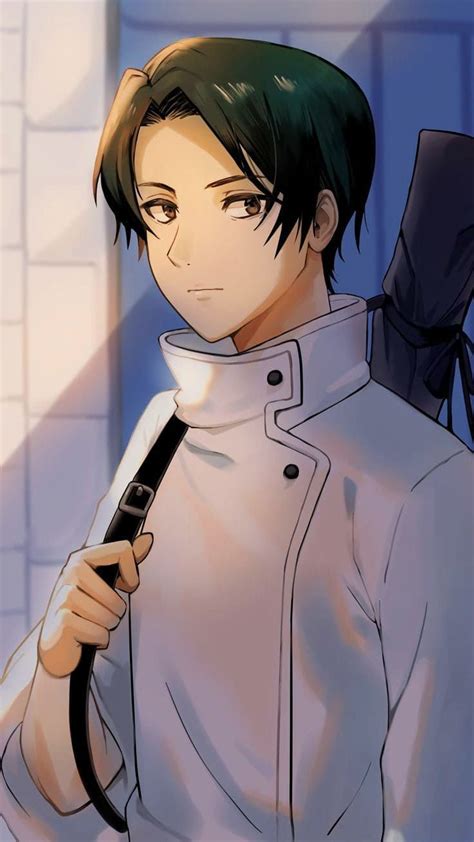 A Man Holding A Cell Phone In His Right Hand And Wearing A White Jacket