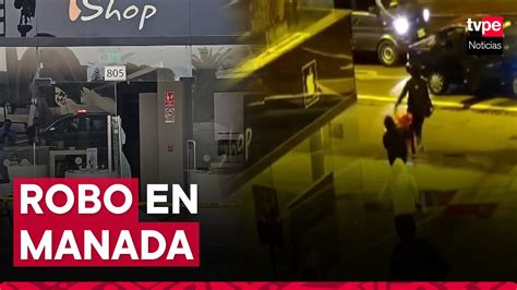 Miraflores más de 10 sujetos asaltan tienda de celulares y se llevan 5