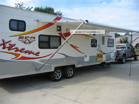 26 Rpm Adventure Toy Hauler With Slide Out Camper