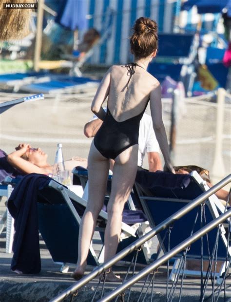 Lily Collins Naked Ass In A Black One Piece Bikini During Ischia Global