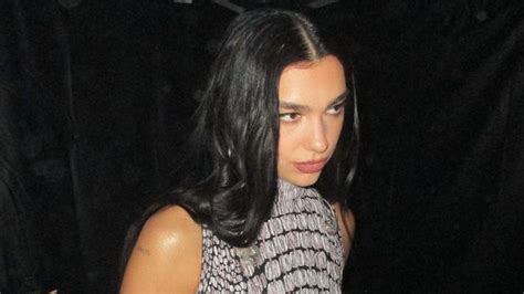Dua Lipa Wore An Alligator Skin Bodysuit With Fishnets And Nothing Else