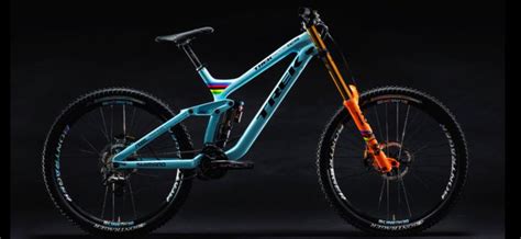 A Blue Mountain Bike Against A Black Background