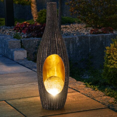 Lampe solaire aspect rotin dorée avec boule de verre Lampe solaire