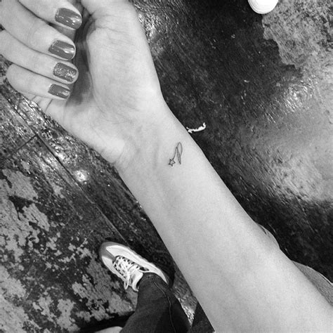 Minimalistic Letter P And Star Tattoo Located On The