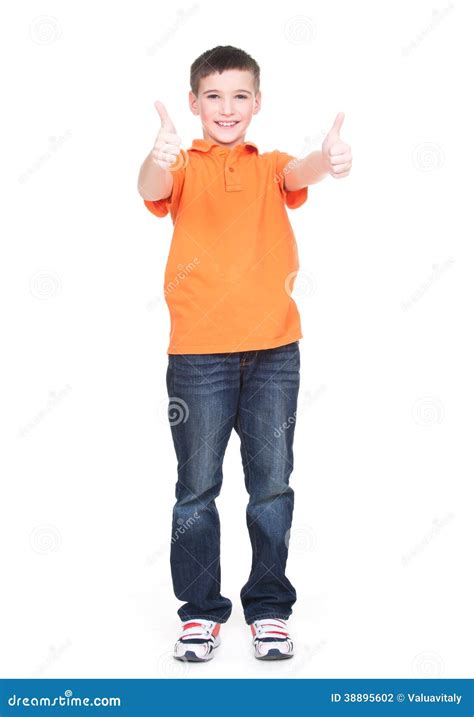 O Menino Alegre Que Mostra Os Polegares Levanta O Gesto Foto De Stock