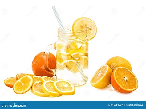 Lemonade In A Mason Jar With A Drinking Straw Decorated With Slices Of