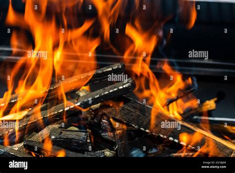 An Amazing View Of Burning Wood Chips Forming Coal Barbecue