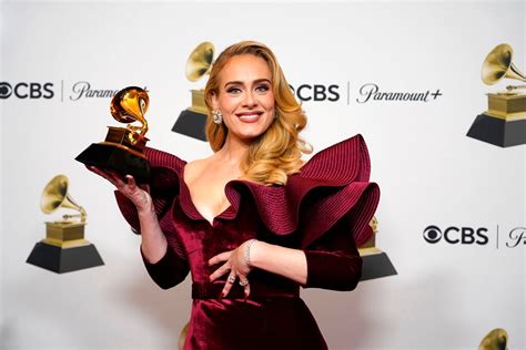 Adele Gets Photographed With A Massive Rock On Her Finger Hinting