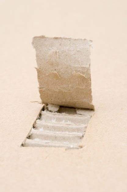 Premium Photo Close Up Of Peeled Off Cardboard Box