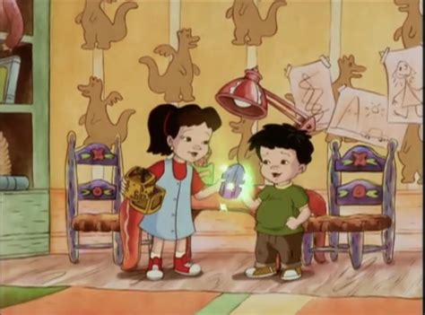 A Compilation Of Emmy And Max Holding The Dragon Scale