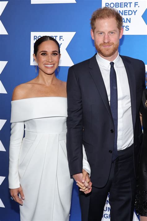 Meghan Markle And Prince Harry Sweetly Hold Hands In Rare Red Carpet