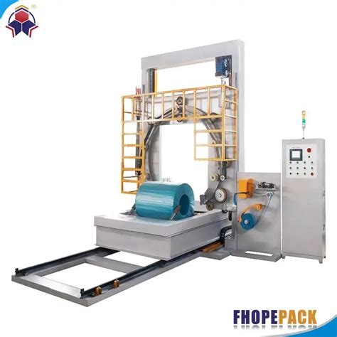 Toroidal Object Wrapping Machine With Efficient Coil Packaging