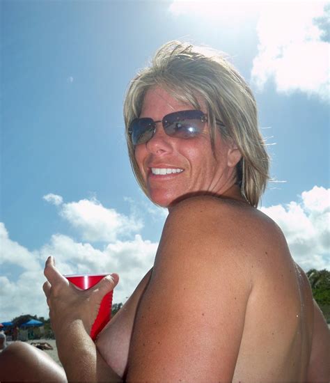 Enjoying Showing Off While Getting An All Over Tan At Homemoviestube