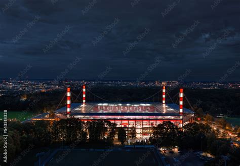 Night aerial view of the illuminated RheinEnergieStadion Müngersdorfer