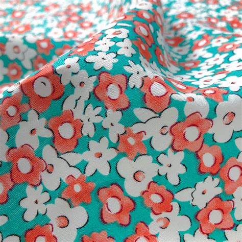 Popeline de Coton imprimé Fleur Aqua En Ligne Mercerine