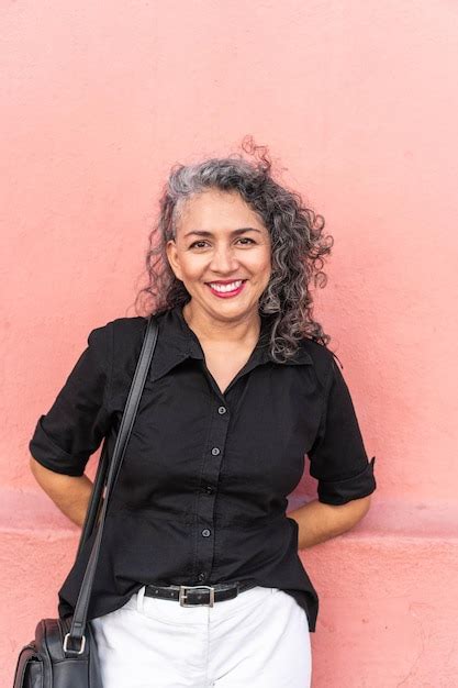 Premium Photo Woman With Gray Hair Standing In The Street