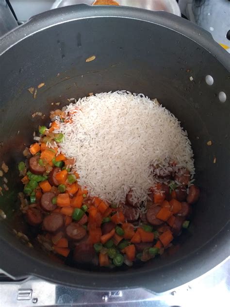 Arroz na panela de pressão Receitas de Todos