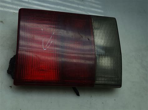 LAMPA LEWY TYŁ LEWA W KLAPĘ AUDI 80 B4 SEDAN za 55 zł z RECZ Allegro