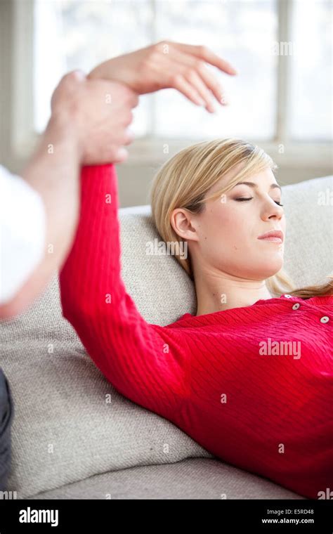 Woman Undergoing Ericksonian Hypnosis The Hand In Catalepsy Indicates