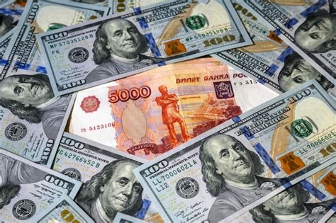 Premium Photo Russian Ruble Money Vs Us Dollar Ruble Banknote Between