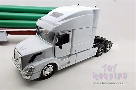 New Ray Long Haul Trucker Volvo VN 780 Flatbed Trailer With Long